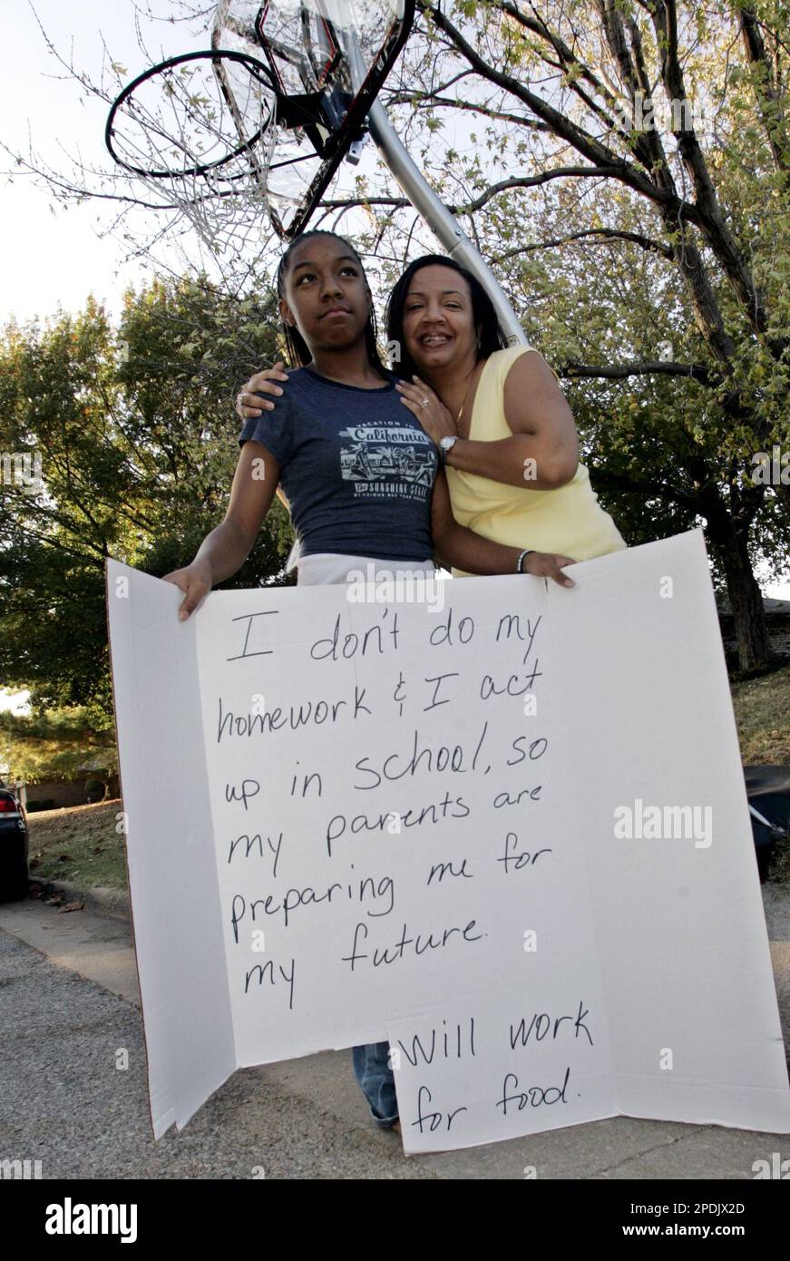 Tasha Henderson, right, and her daughter, Coretha, left, pose for a ...
