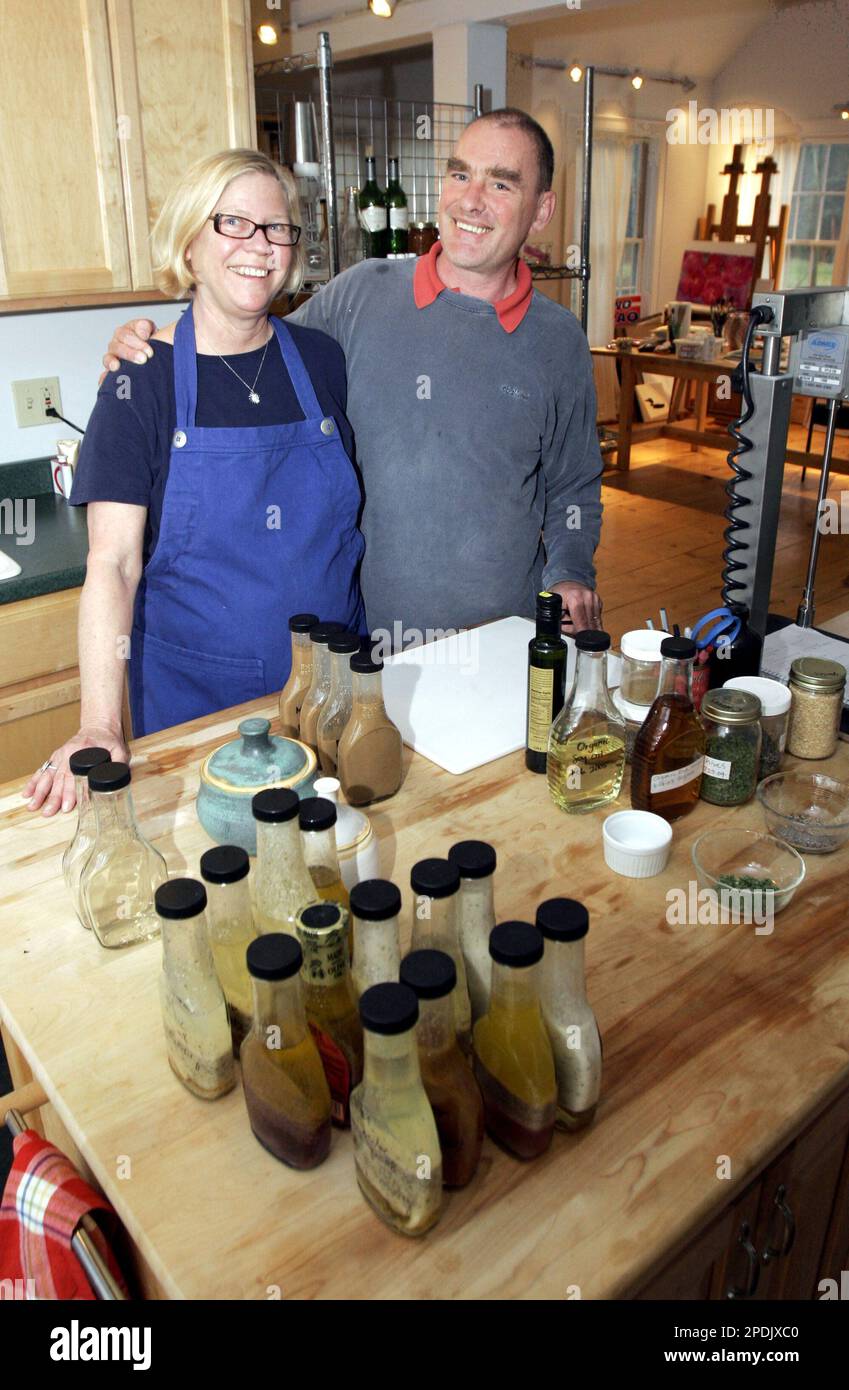 Annie Christopher, left, and her husband, Peter Backman, stand in the ...