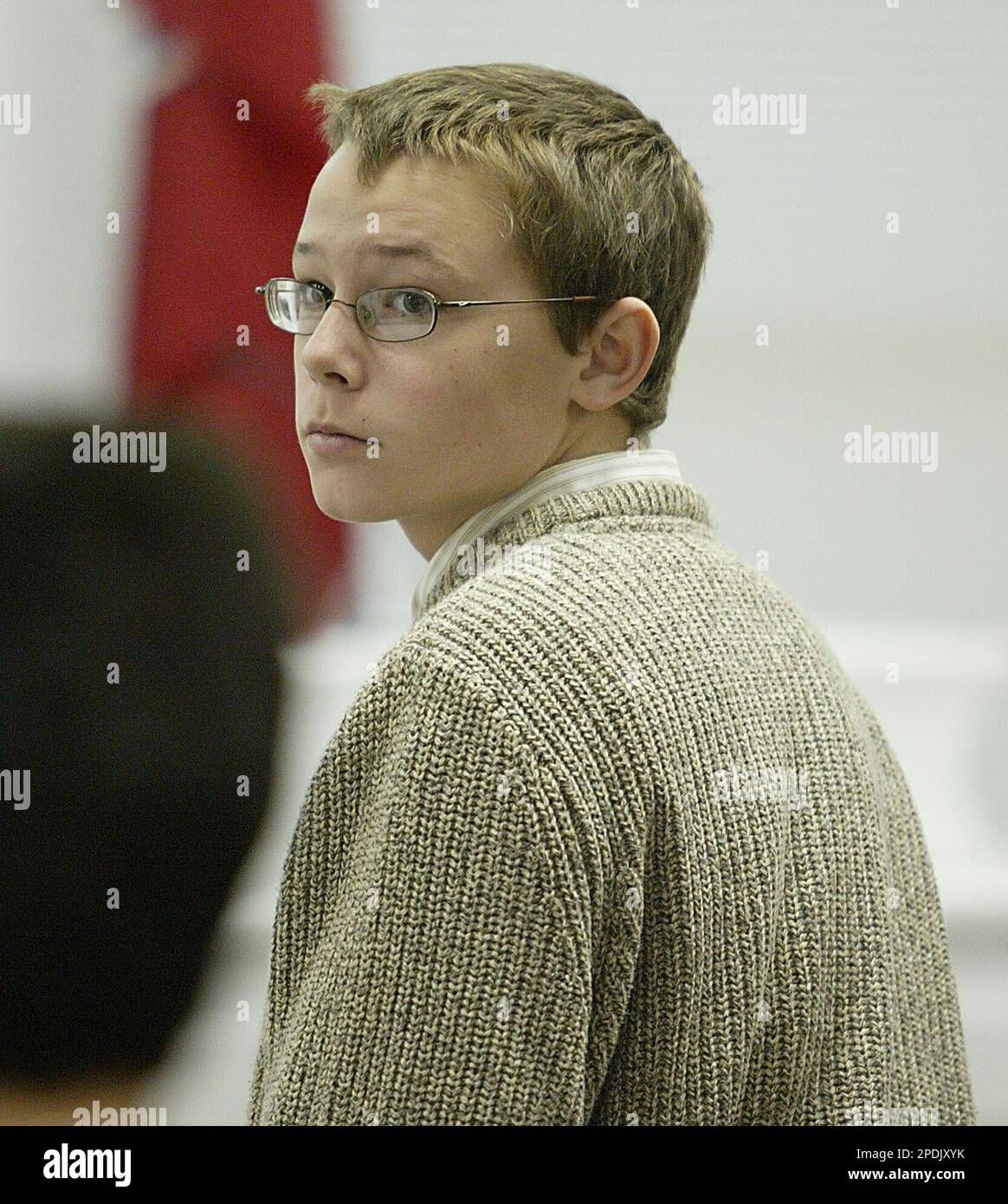 Shooting suspect Ken Bartley Jr., 14, watches as special juvenile judge ...