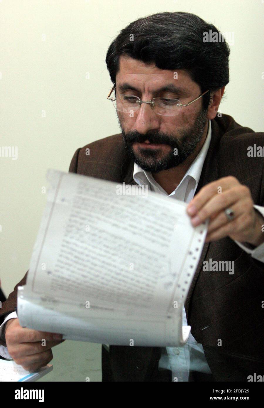 Qasem Shabani, lawyer of Intelligence Ministry agent Mohammad Reza Aghdam Ahmadi, unseen, who ...