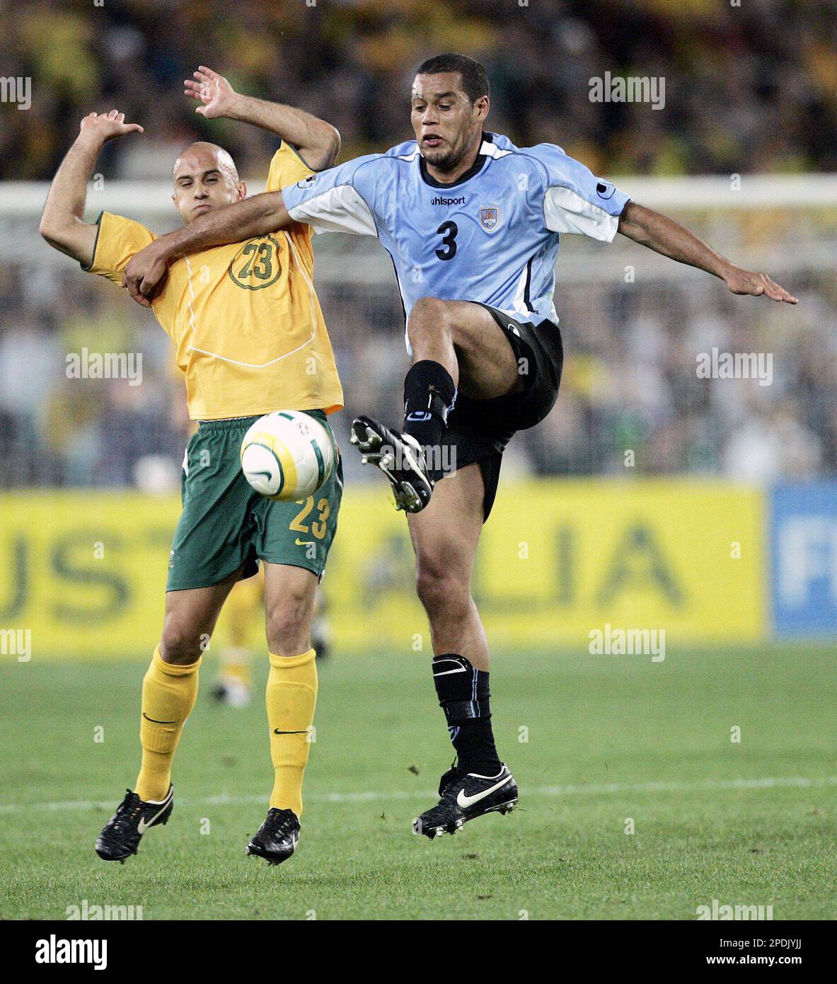 Uraguay's Daro Rodriguez, right, takes the ball from Australia's Marco ...