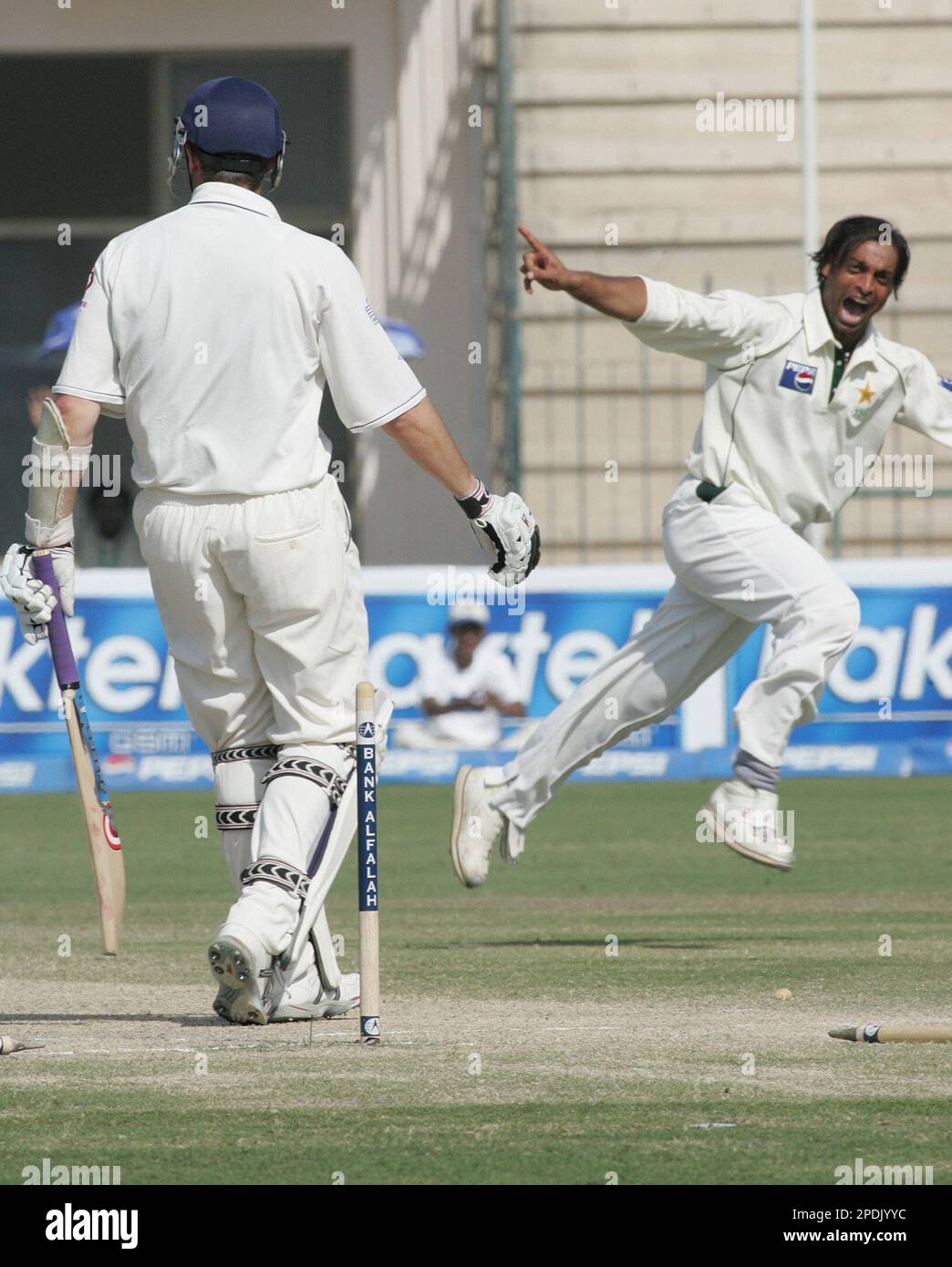 Pakistan's bowler Shoaib Akhtar, right, celebrates dismissal of England ...