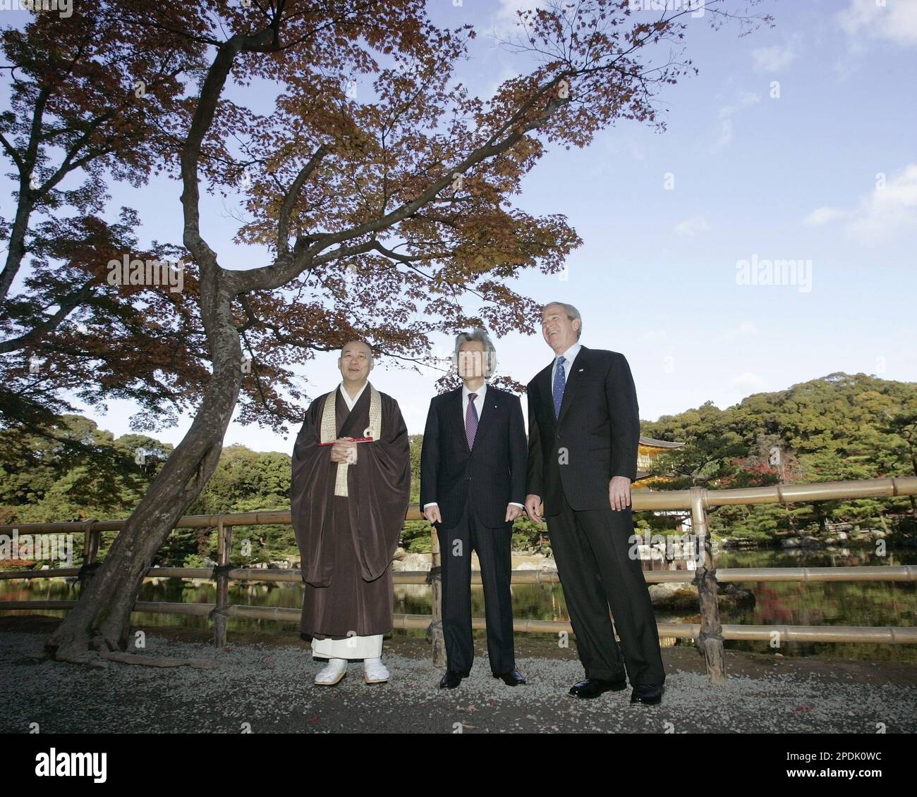 Prime Minister of Japan Junichiro Koizumi, center, stands with U.S ...