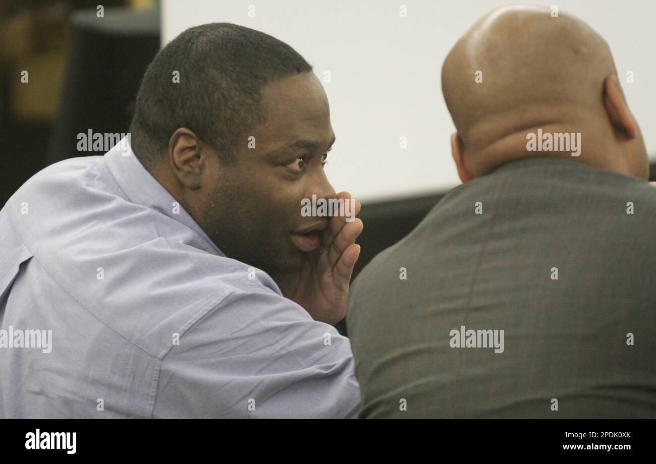 Edward Lee Busby Jr. talks with attorney Steve Gordon during the ...