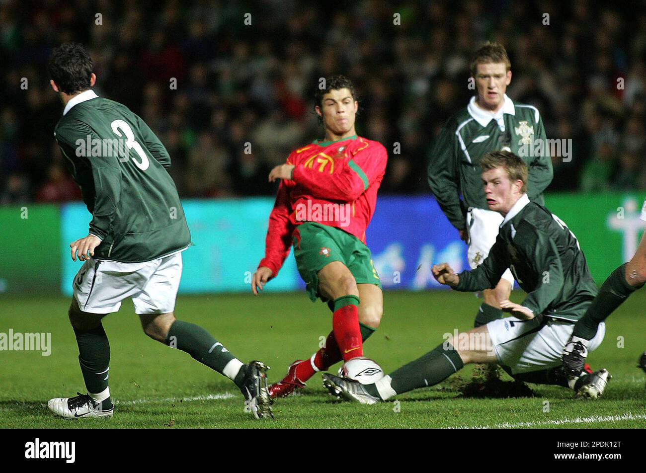 Portugal's Cristiano Ronaldo trys to get past Northern Ireland's Tony ...