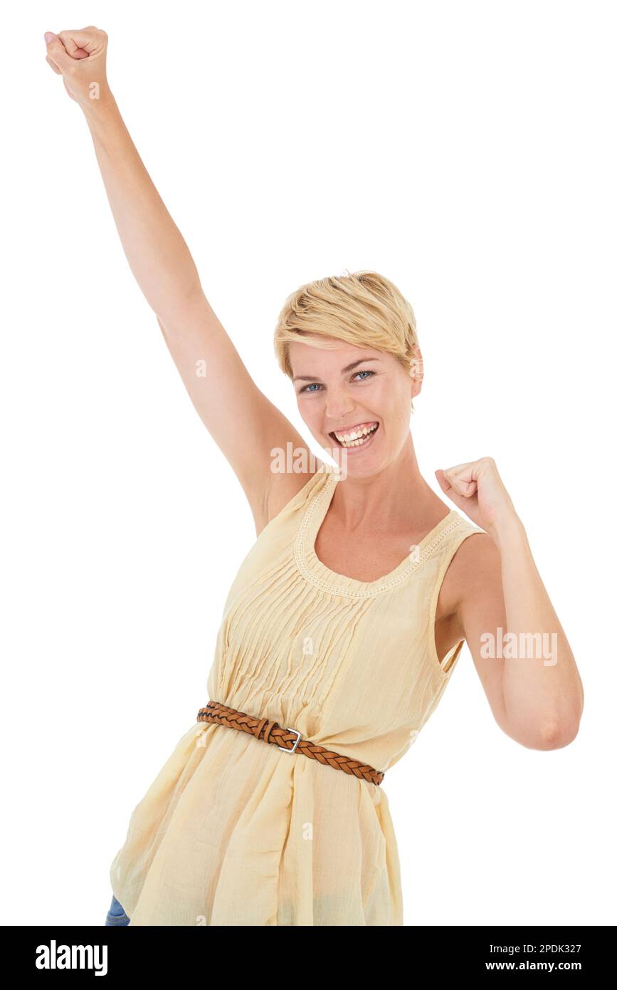 Shes a winner. An excited young woman celebrating while isolated on a ...