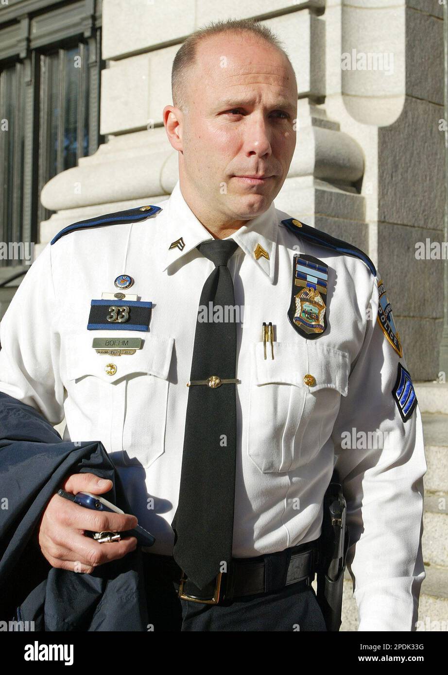 Providence Police officer Sgt. Robert Boehm exits U.S. District Court ...