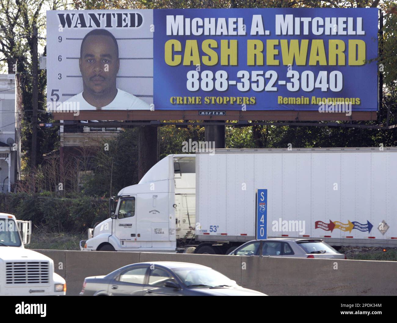 This crime stoppers billboard offering a cash reward for information on ...