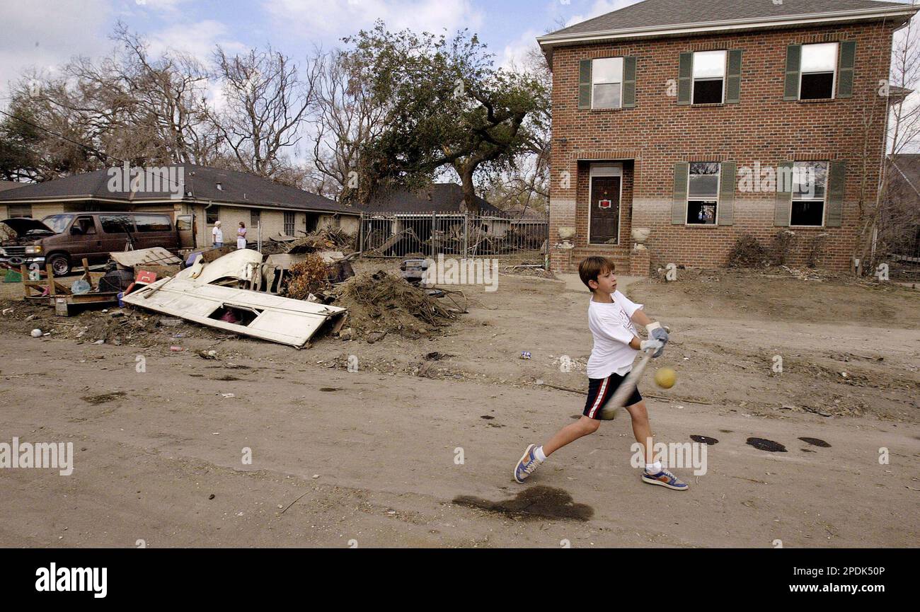 Stephen Maggio, 11, participates in a game of pick-up softball on ...