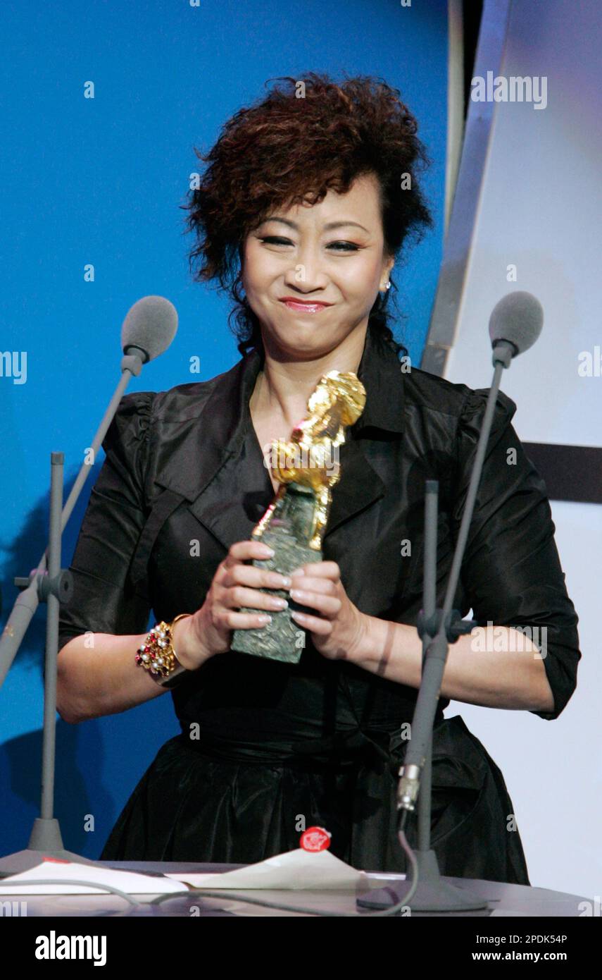Hong Kong actress Yuen Qiu receives the award for Best Supporting ...