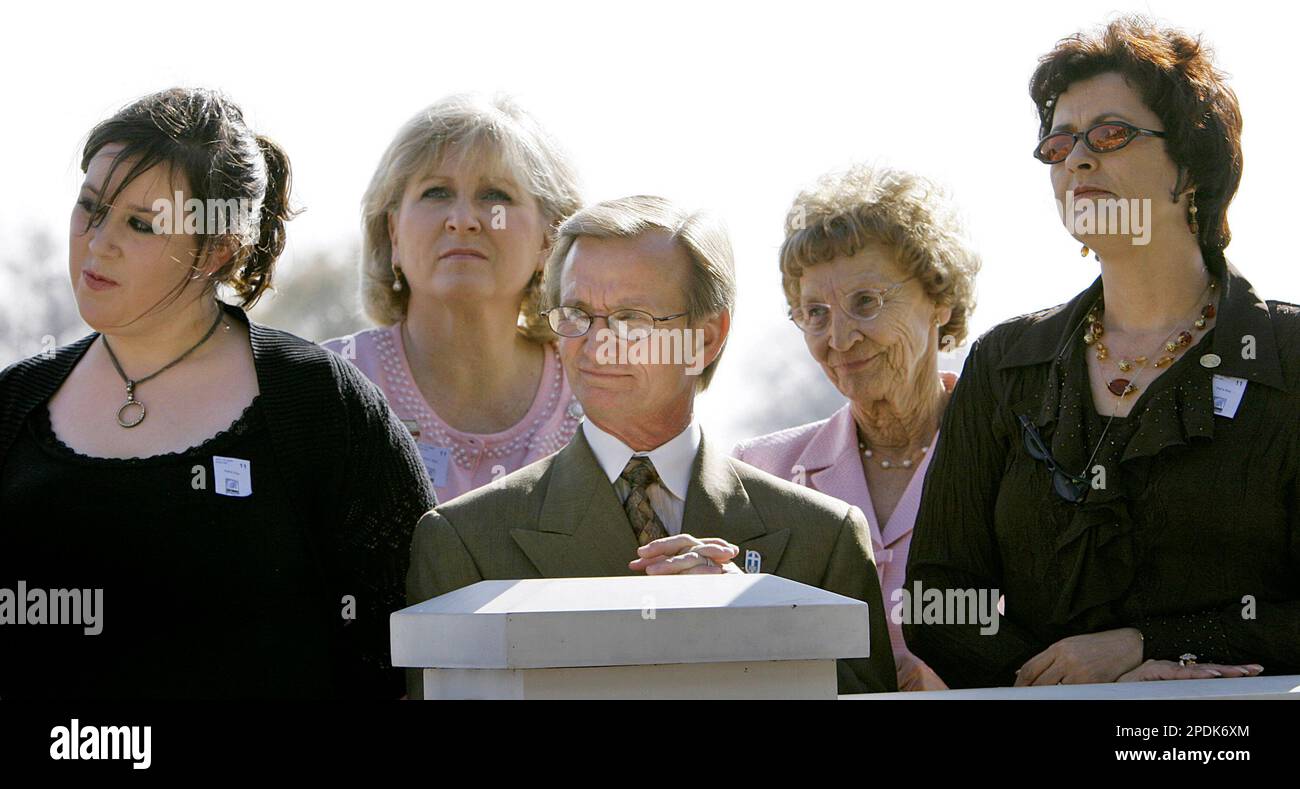 Retiring Hall of Fame jockey Pat Day, center, is flanked by his wife ...