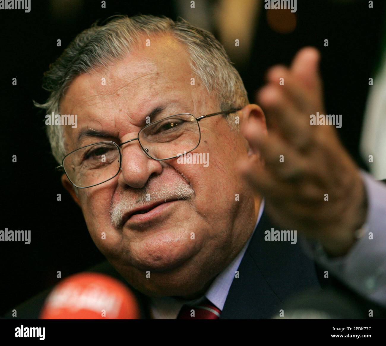 Iraqi President Jalal Talabani gestures during a press conference on ...