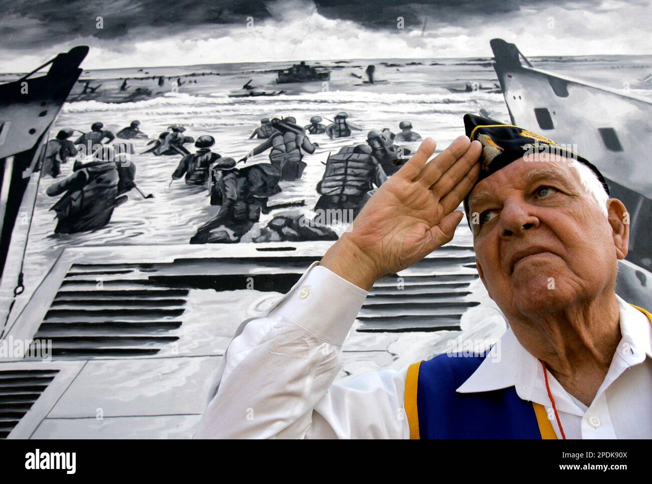 Leonard Roppolo, Jr., 81, salutes during the National Anthem at a ...