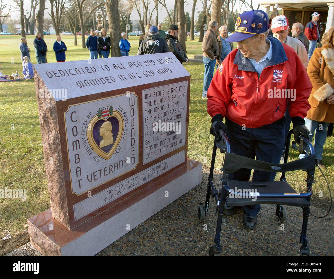 George Jahner looks over the new Purple Heart Memorial following ...