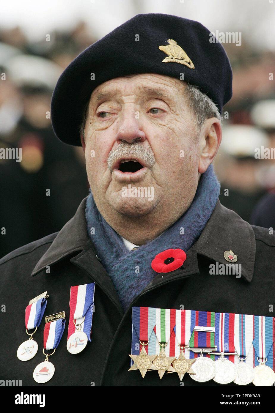 Second World War veteran Paul-Emile Pouliot sings the national anthem ...