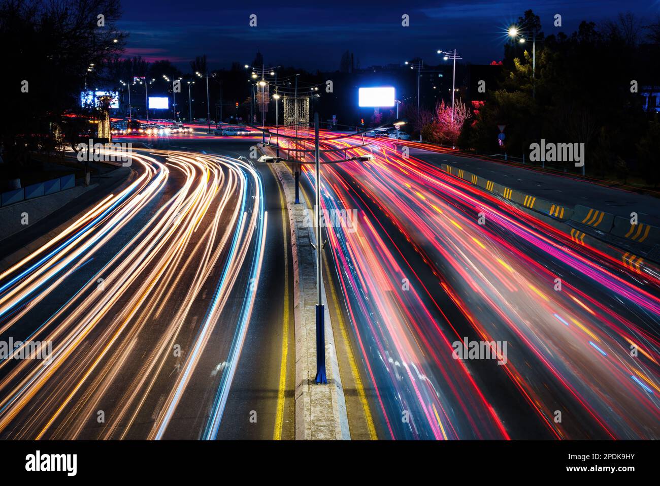 Car traffic light at night city highway Stock Photo - Alamy