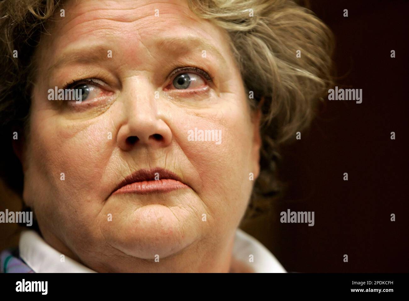 Kathleen Ham listens during a news conference in New York, Wednesday ...