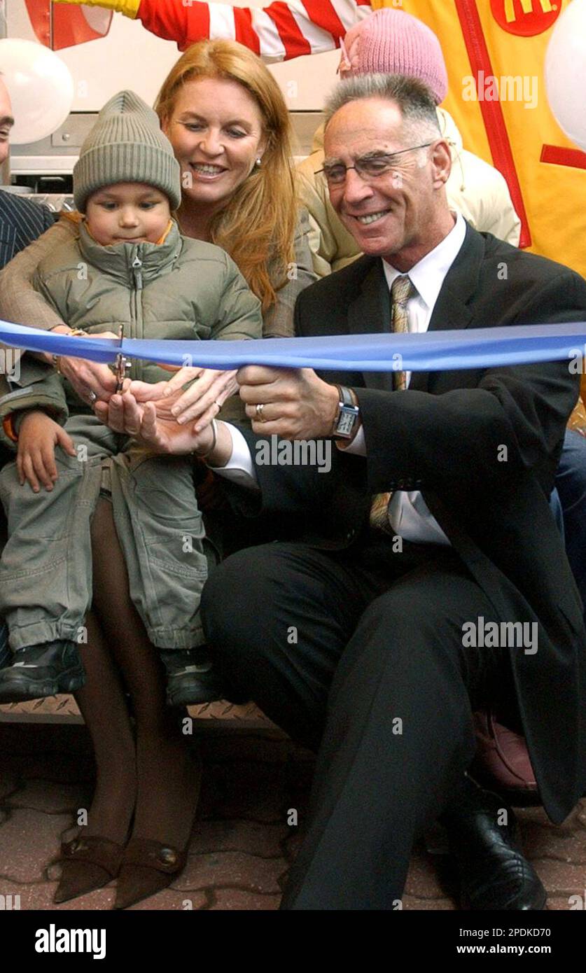 The Duchess of York, Sarah Ferguson, center, and Ken Barun, right, head ...