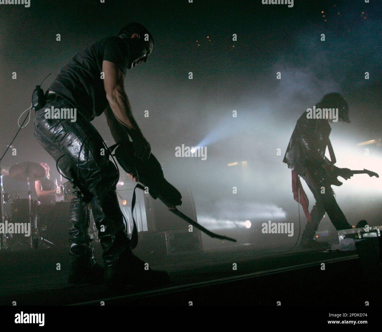 Trent Reznor, front man for the rock band Nine Inch Nails smashes his ...