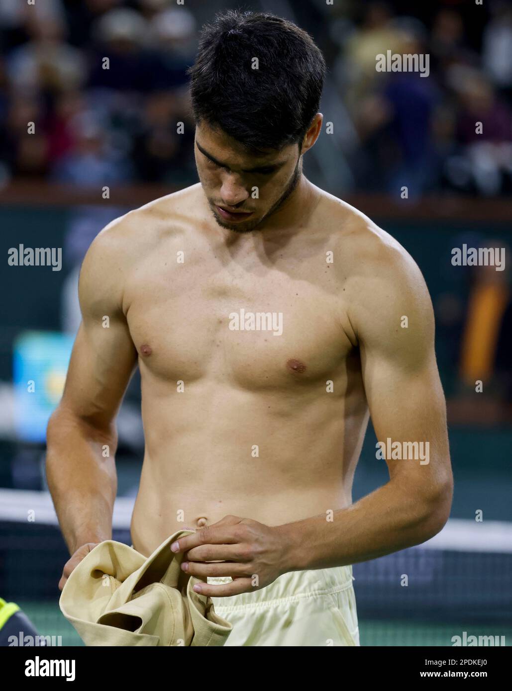 March 14, 2023 Carlos Alcaraz of Spain changes his shirt after his ...