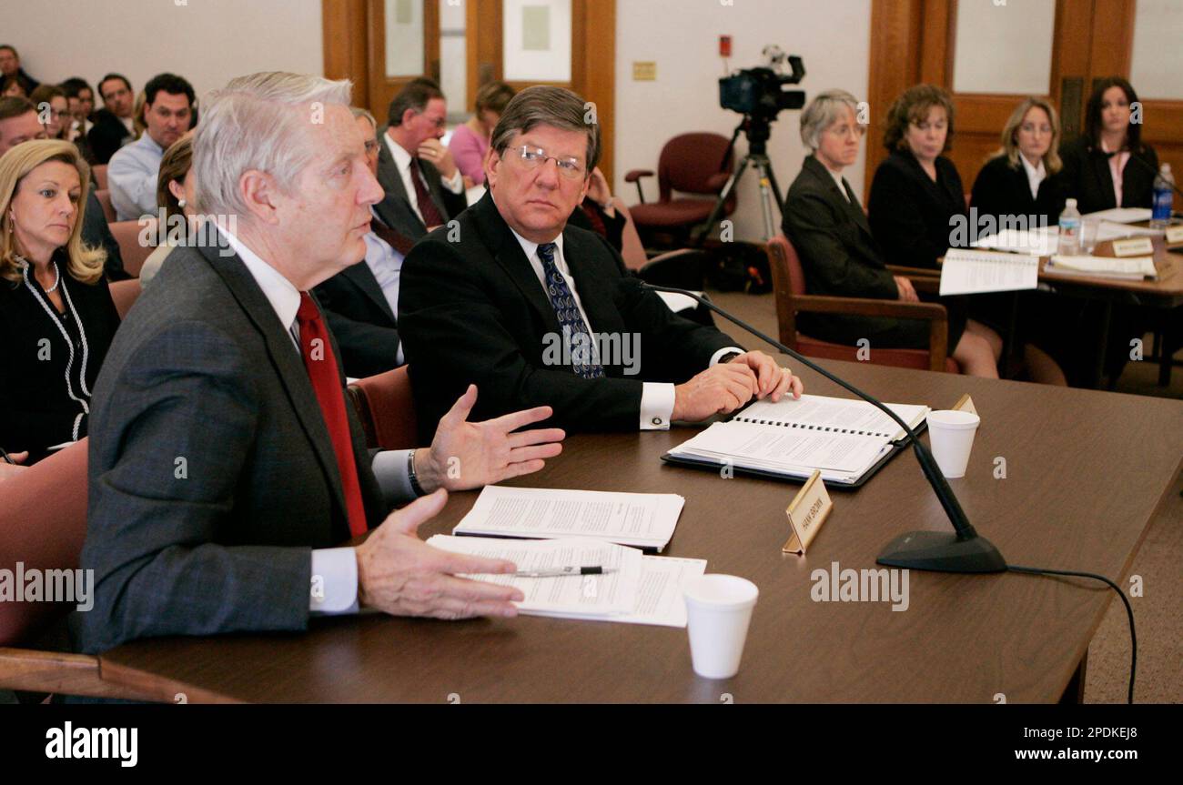 University of Colorado president Hank Brown, left, testifies in Denver ...
