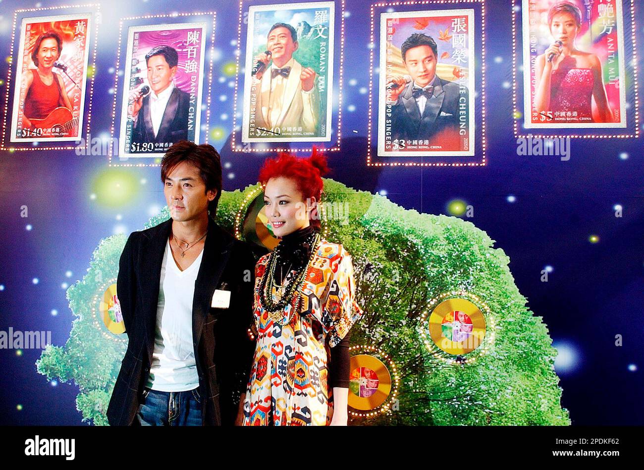 Hong Kong singers Ekin Cheng, left, and Joey Yung pose in front of ...