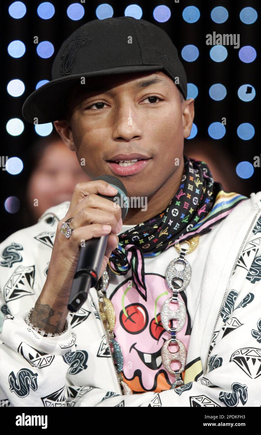 Singer Pharrell appears on stage during MTV's "Total Request Live" show ...