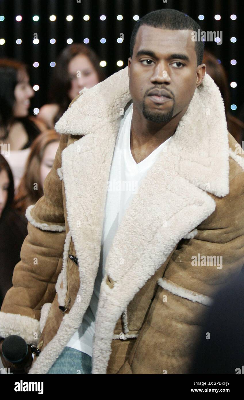 Singer Kanye West appears on stage during MTV's "Total Request Live ...