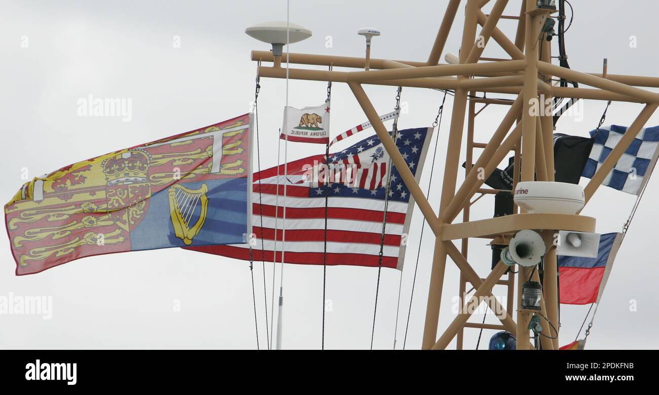 The personal flag of Britain's Prince Charles, left, flies from the ...