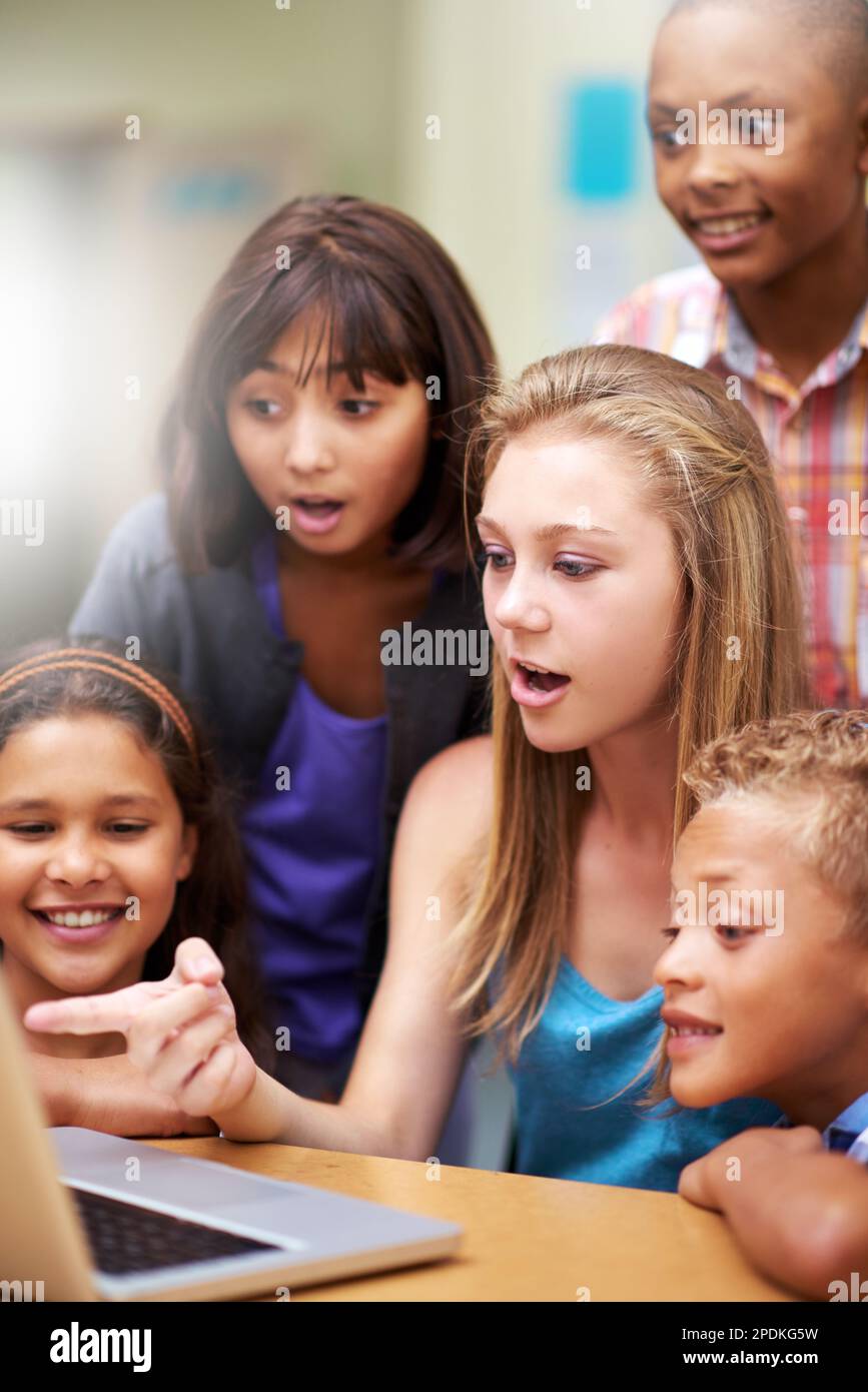 Middle school students working computer hi-res stock photography and ...