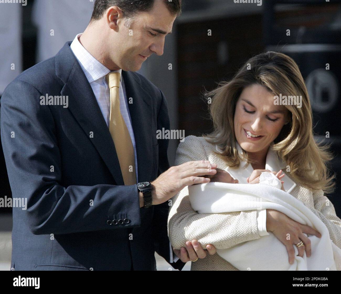 Spanish Crown Prince Felipe, left, and his wife Princess Letizia Ortiz ...