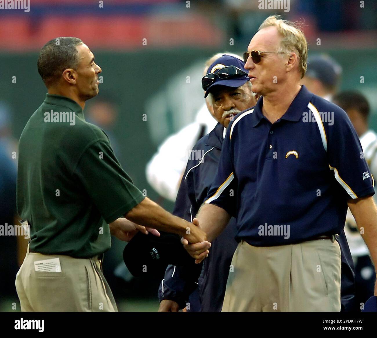 New York Jets coach Herman Edwards, left, congratulates San Diego ...