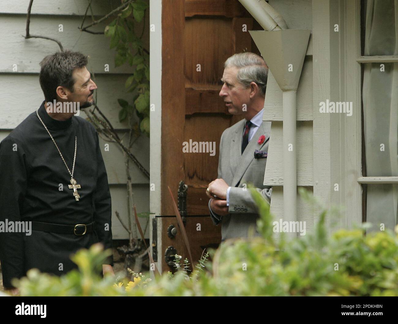 Britain's Prince Charles, right, meets Pastor Tom Brindley as he leaves ...