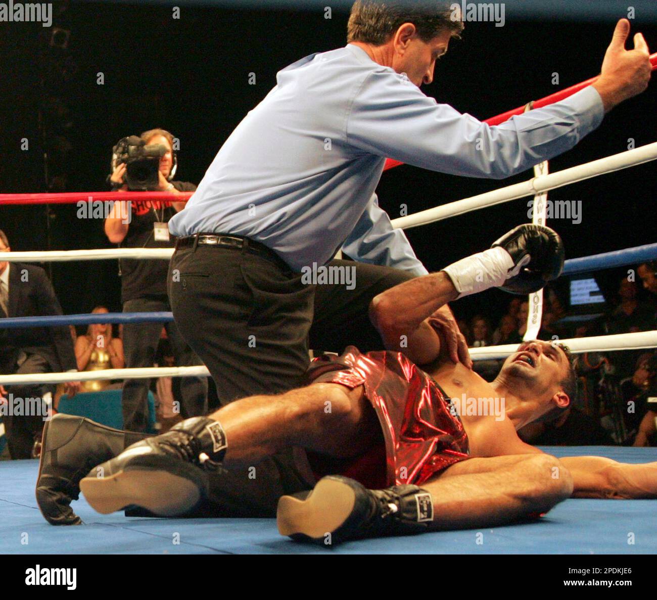 Scott Pemberton lies on the matt after being knocked out by Jeff Lacy in the second round at ...