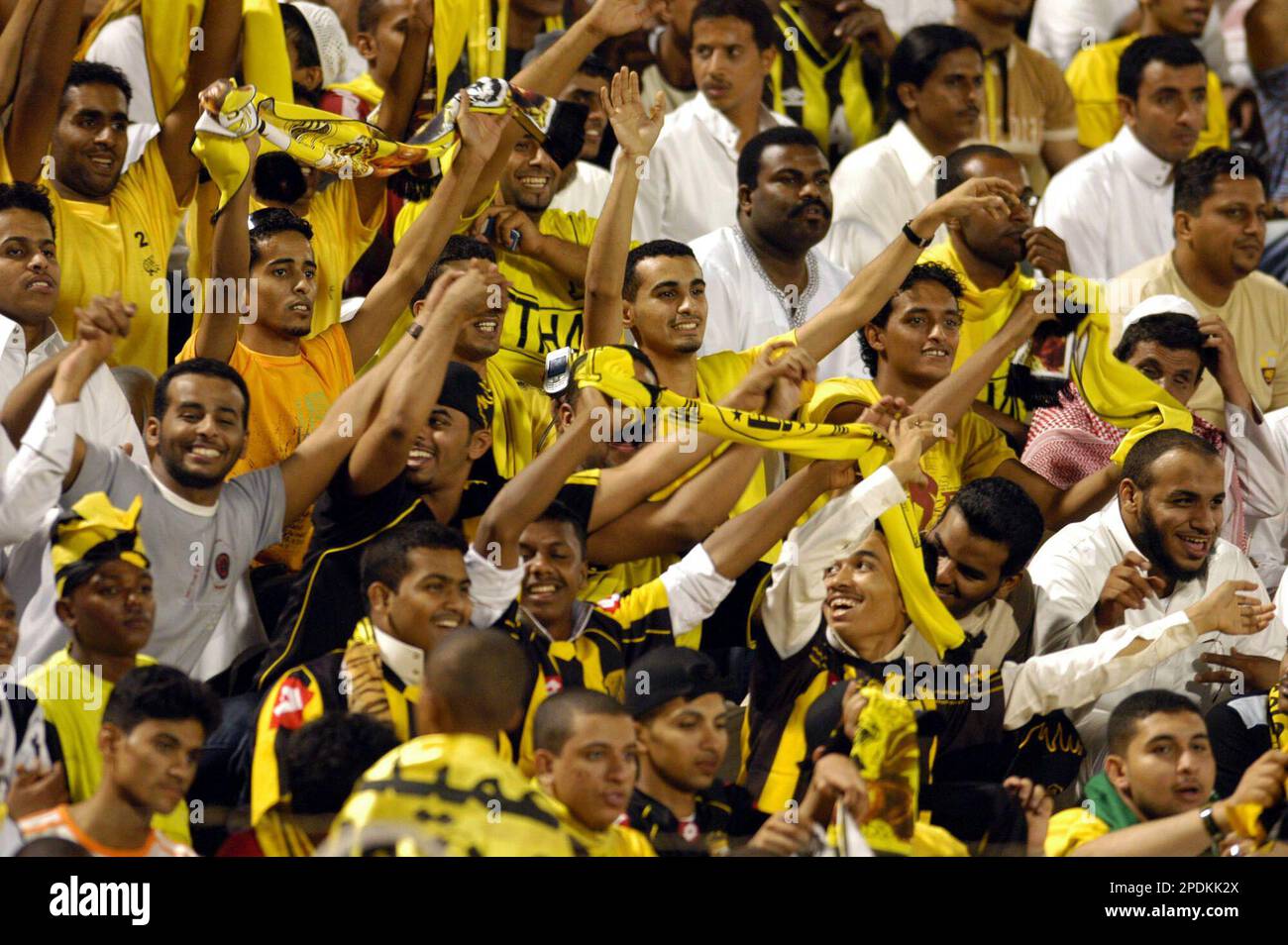 Saudi' Al Ittihad fans celebrate after winning the AFC Champions League ...