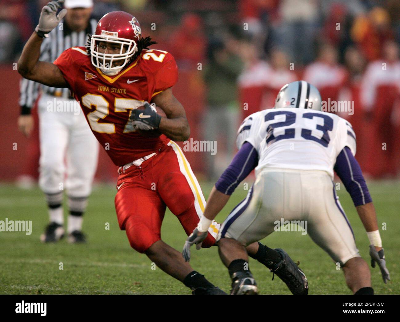 Iowa State's Stevie Hicks, left, runs from Kansas State defender Jesse ...