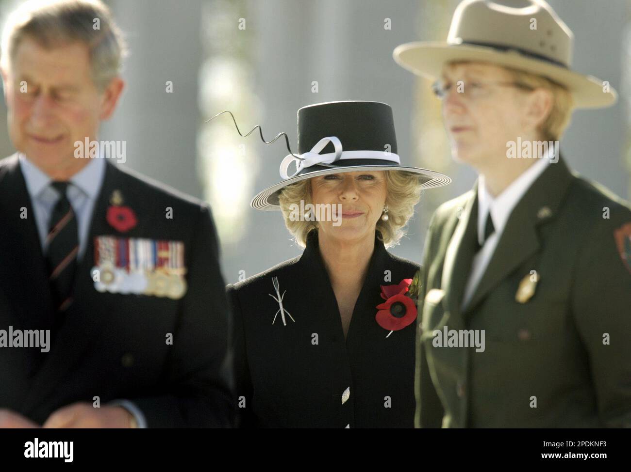 Camilla, Duchess of Cornwall, center, walks between Britain's Prince ...
