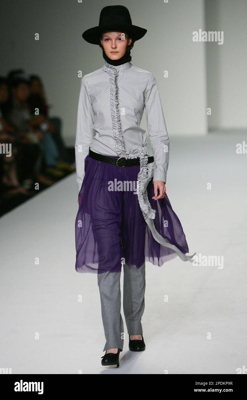 Thai model walks on the catwalk showing a design by Thai designer ...