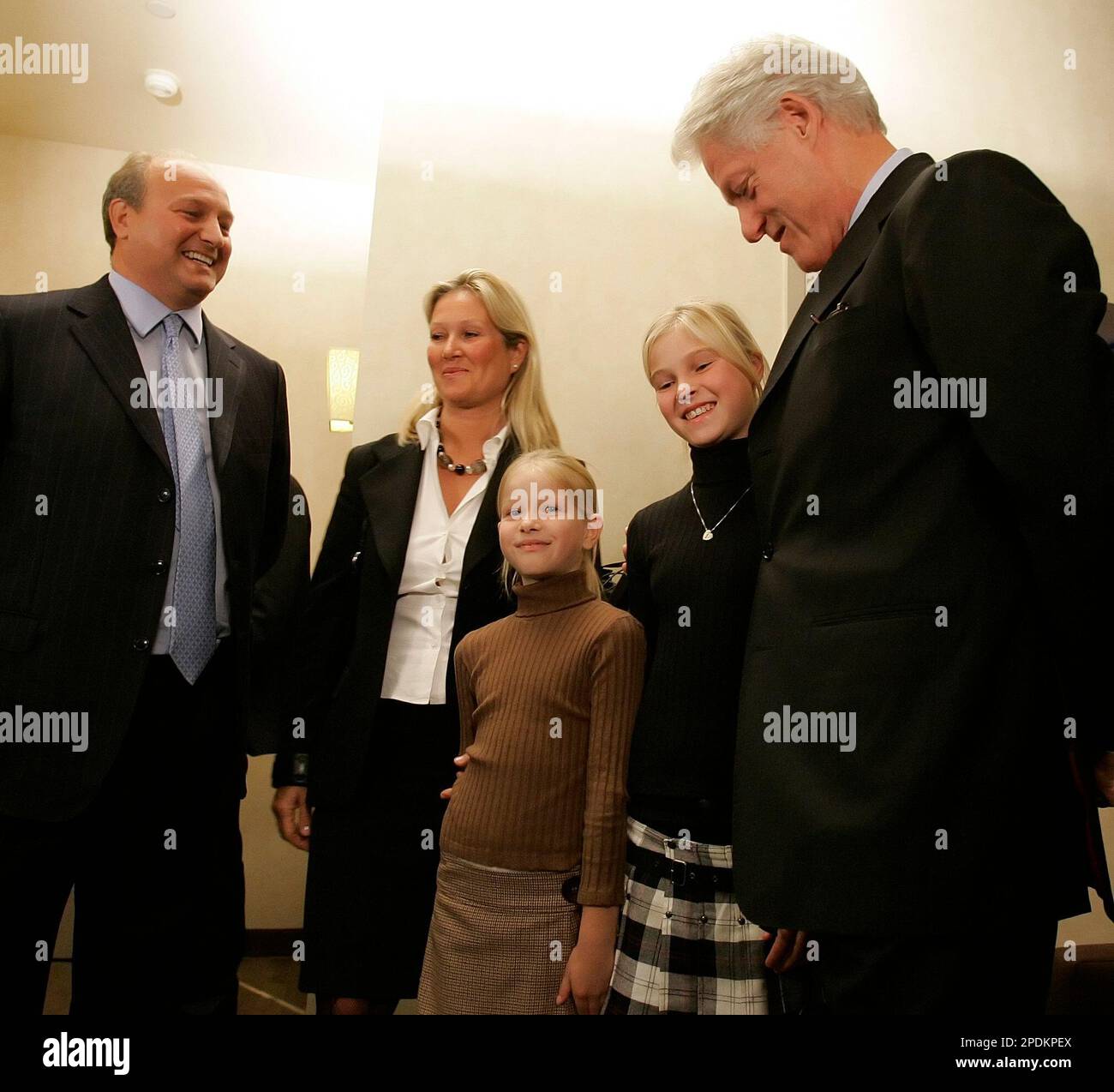 Tilly Smith, 11, from Oxshott, England, second from right, greets ...