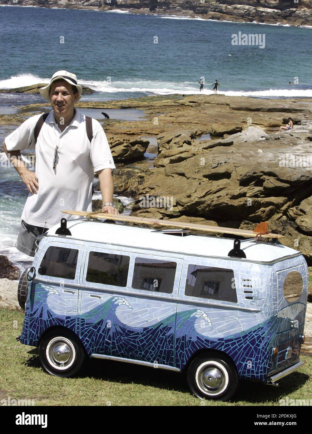 An unidentifed beach goer poses for a photo with Ben Resch's creation ...