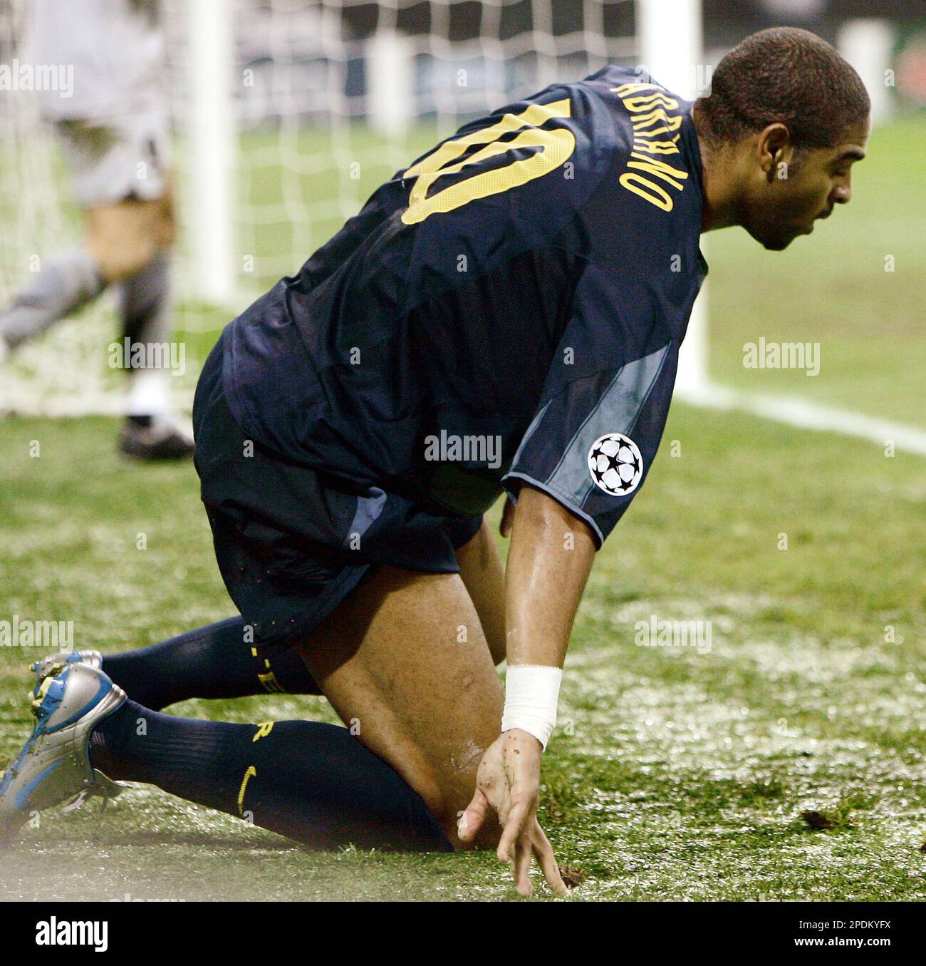 Inter Milan's striker Adriano of Brazil reaches to keep his balance ...