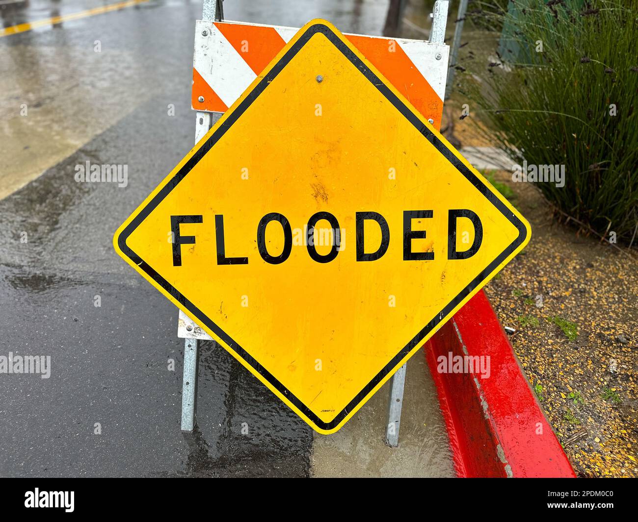 Santa Barbara, California, USA. 14th Mar, 2023. A yellow flooded sign in downtown Santa Barbara ...