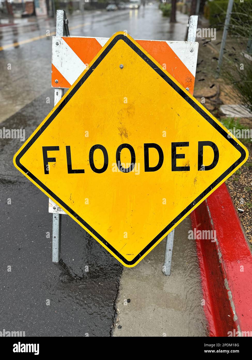 Santa Barbara, California, USA. 14th Mar, 2023. A yellow flooded sign in downtown Santa Barbara ...