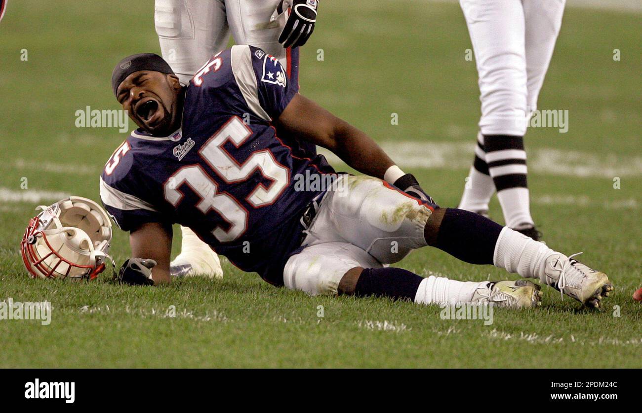 New England Patriots running back Patrick Pass holds his hamstring ...