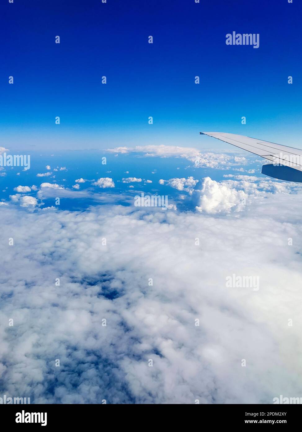 Amazing aerial view seen through window of flying aeroplane. Scenic ...