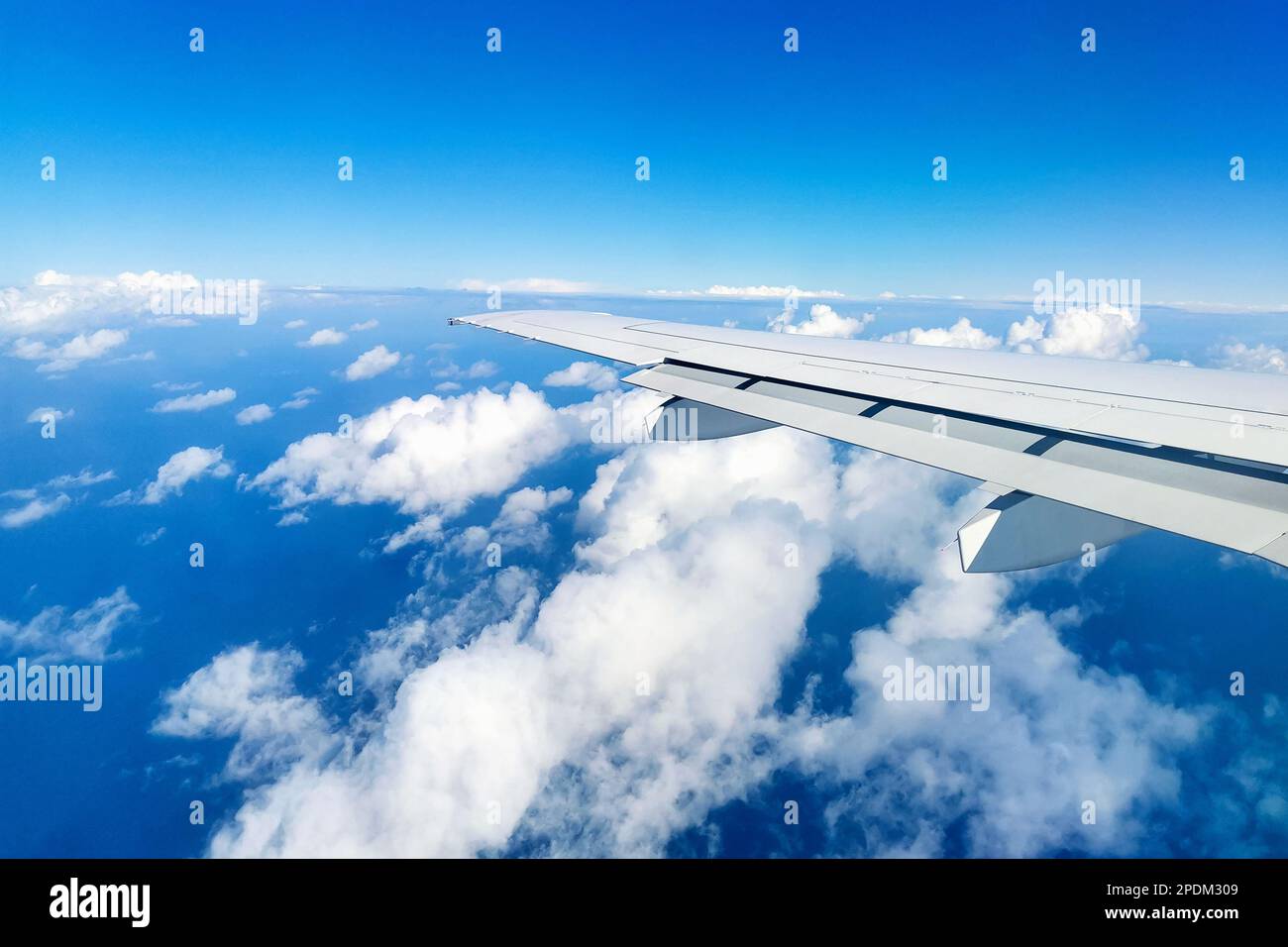 Amazing aerial view seen through window of flying aeroplane. Scenic ...