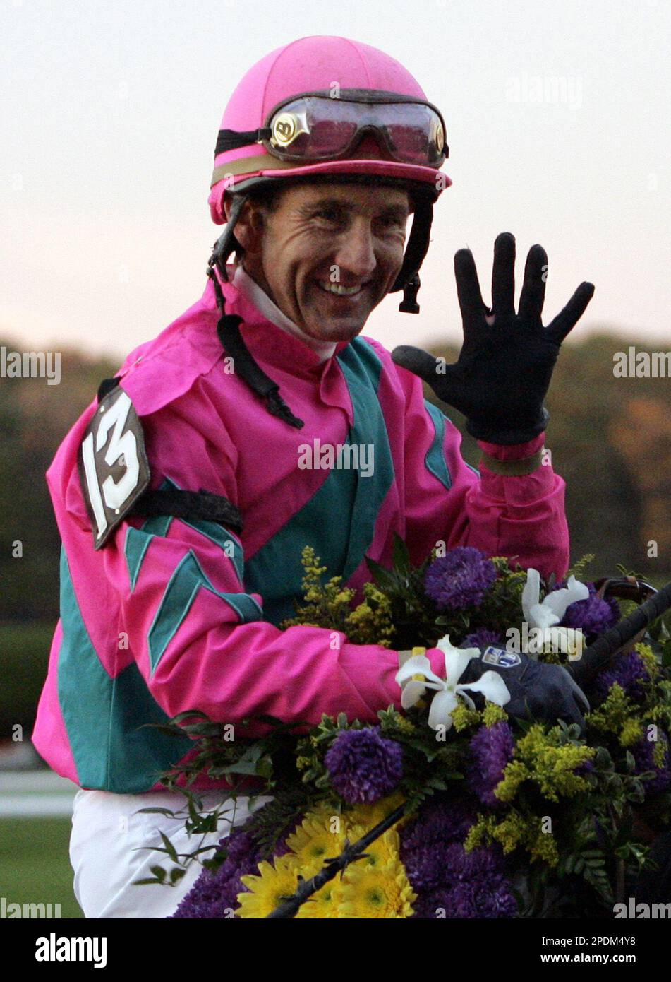 Jockey Jerry Bailey waves after winning the Breeders' Cup Classic on ...
