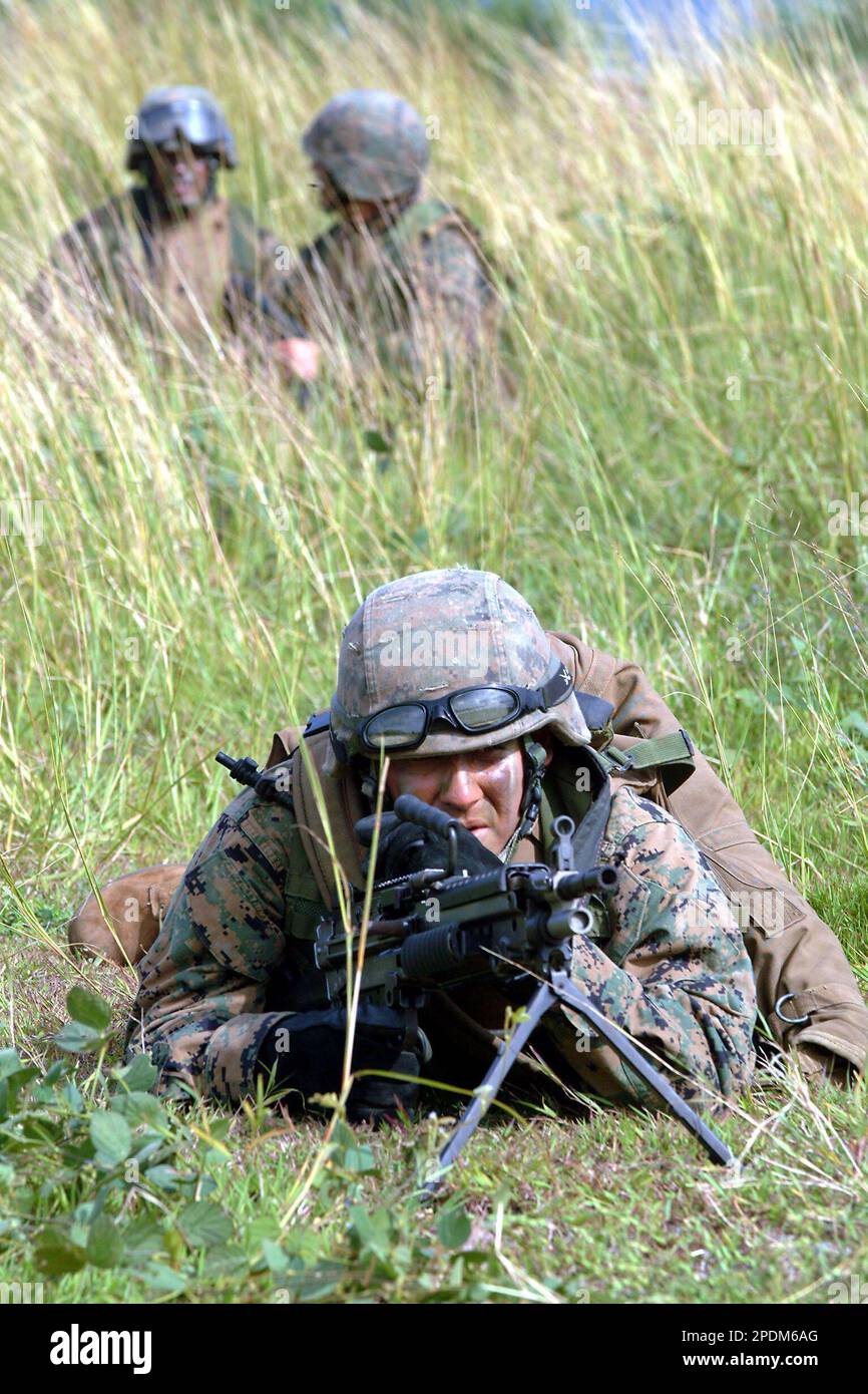 A U.S. Marine positions at a beach landing exercise with Philippine ...