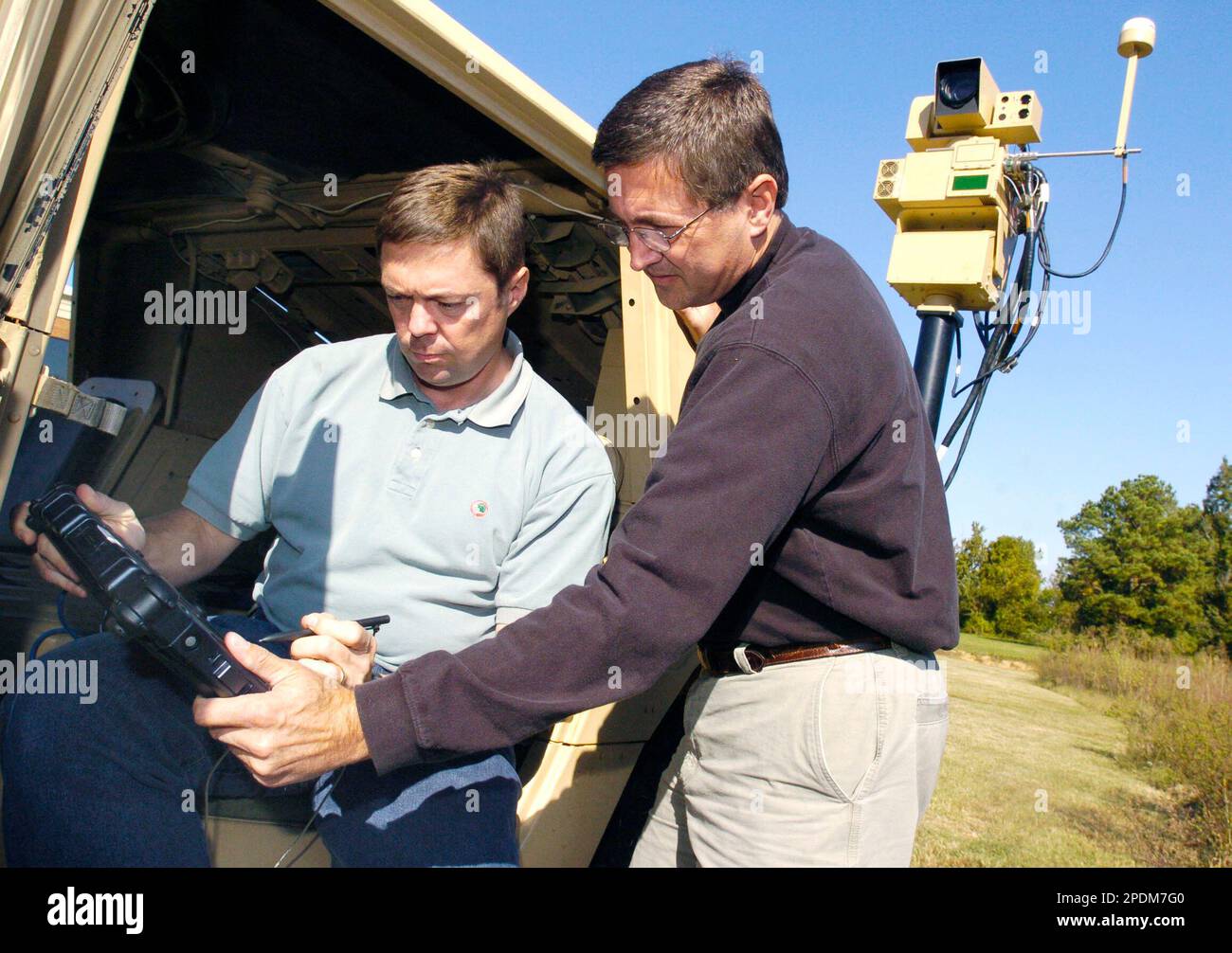 Radiance Technologies engineers Frederick Gant, left, and Tim Patterson ...