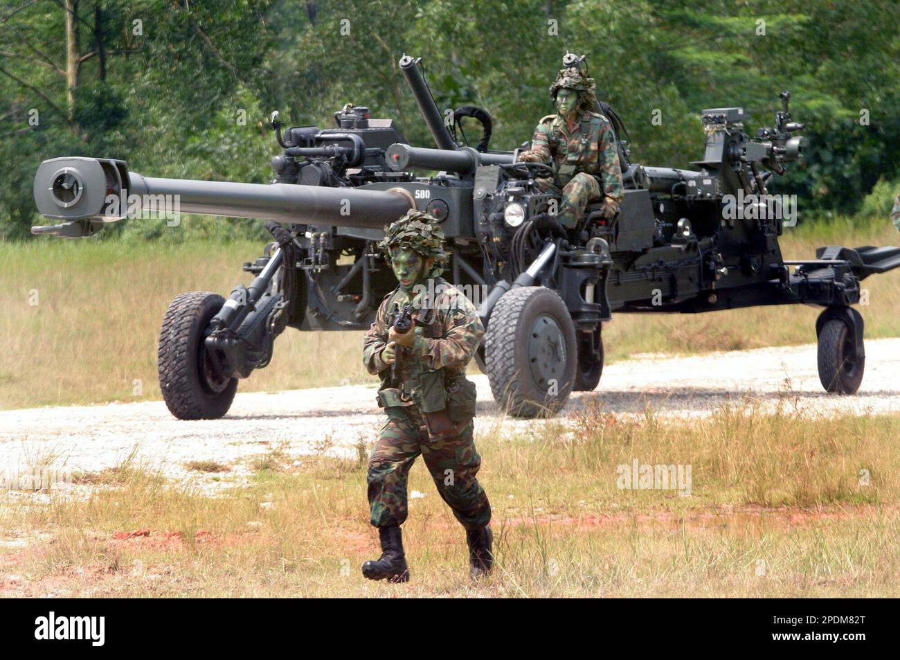 Singapore Armed Forces Soldiers steer the Pegasus, a Howitzer, during a ...